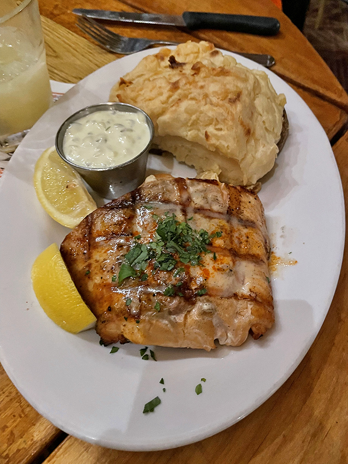 This grilled salmon with a twice-baked potato isn't just dinner&mdash;it's edible architecture. The fish flakes with just a gentle nudge of your fork.