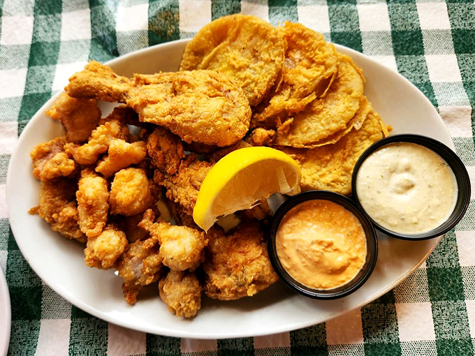Golden-fried seafood perfection awaits on this platter. Crispy treasures from Florida waters served with dipping sauces that make you want to high-five the chef.