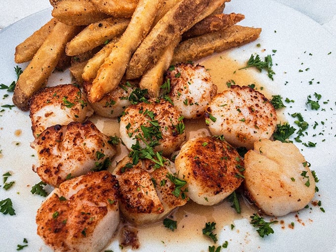 Scallops seared to golden perfection, like little ocean marshmallows with a caramelized crust. The chef clearly knows the meaning of respect. 