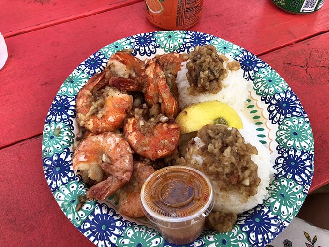 Shrimp nirvana on a colorful plate. The scampi arrives with that telltale garlic aroma that will linger on your fingers (and in your memories) for days.