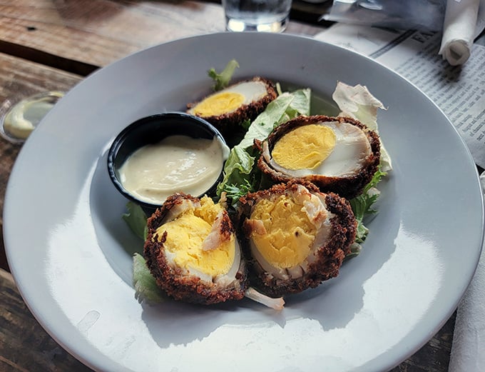 Scotch eggs that would make a Glaswegian weep with joy—perfectly soft-centered eggs wrapped in savory sausage armor, ready for battle with your appetite.