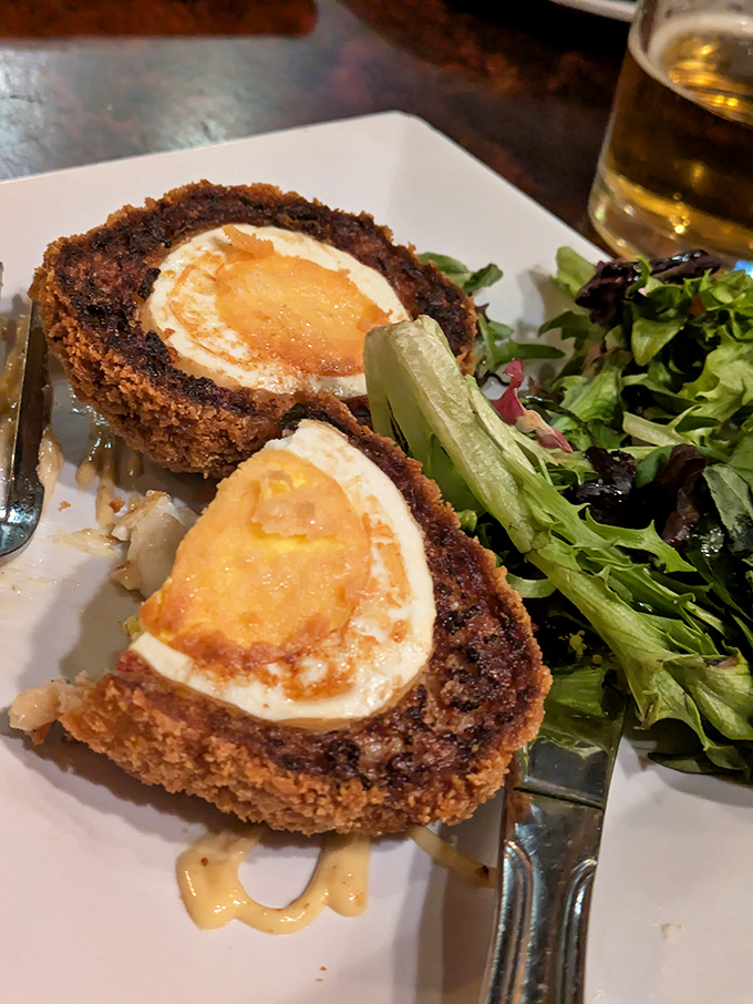 Scotch eggs: because wrapping sausage around eggs and frying them is the kind of brilliant thinking that built civilizations.