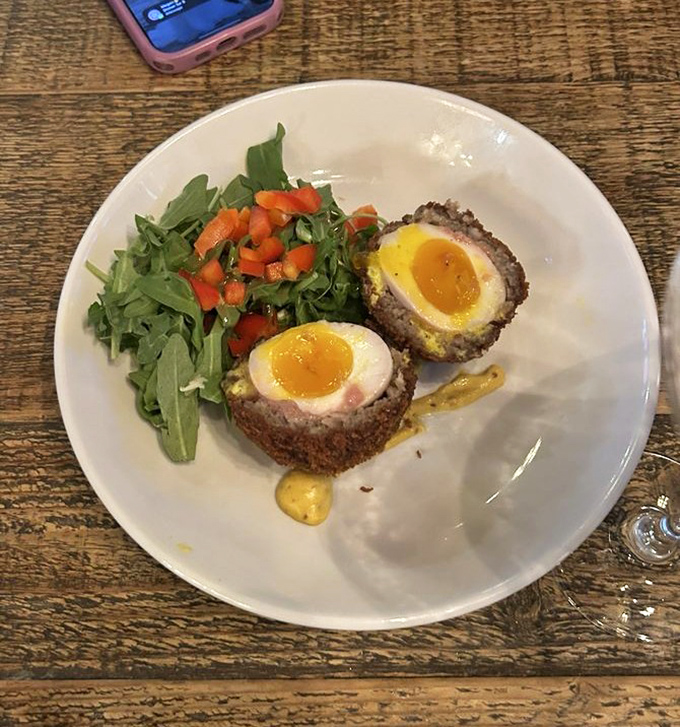 The Scotch egg that proves sometimes the best comfort food comes wrapped in mystery.