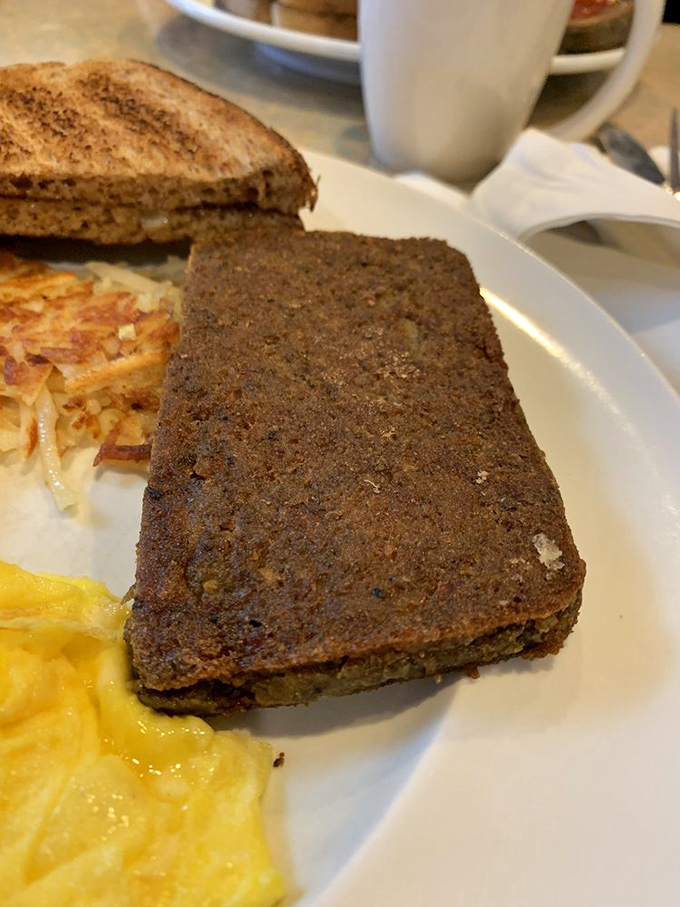 Scrapple done right &ndash; crispy outside, tender inside, like Pennsylvania's answer to breakfast heaven.