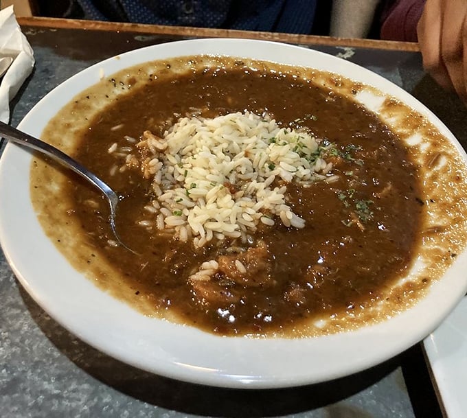 This isn't your tourist-trap gumbo. Dark roux, perfectly seasoned, with a depth of flavor that tells stories of generations past.