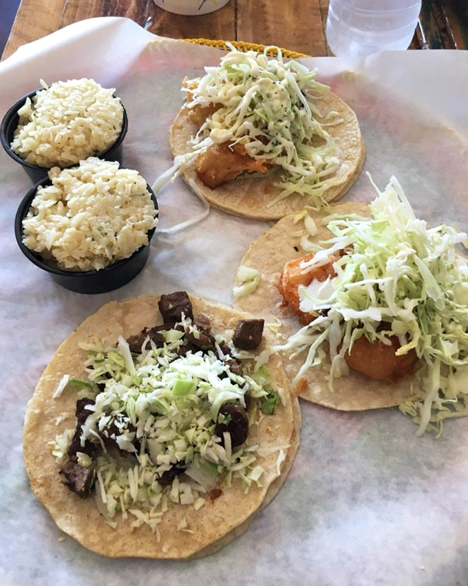 A trio of tacos that showcases the kitchen's versatility&mdash;from the ocean's bounty to the rancher's pride, all nestled in handmade tortillas that deserve their own fan club.