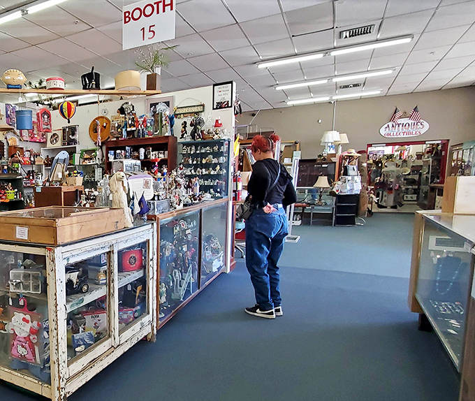 Booth 15 beckons with treasures organized with military precision. One person's clutter is another's carefully curated collection of possibilities.