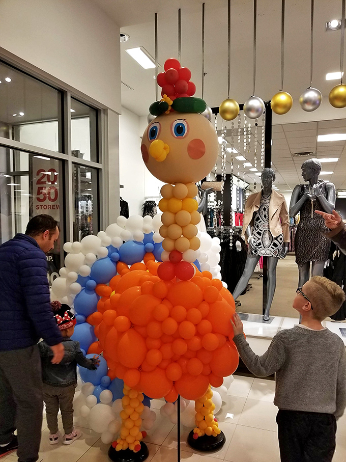 This whimsical balloon creation proves shopping centers aren't just for commerce&mdash;they're where childhood wonder meets parental credit card limits.