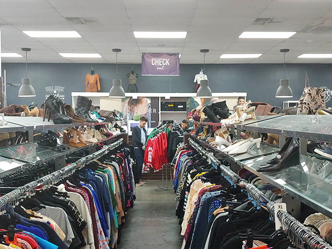 Beneath industrial lighting, the check-out area stands ready for the parade of proud bargain victors and their newfound treasures.