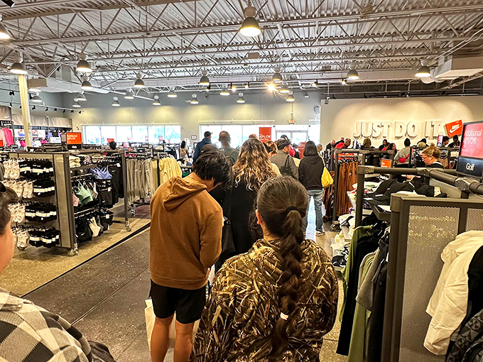 The Nike pilgrimage in full swing. Notice the determined faces &ndash; that's the look of people who smell 40% off athletic wear.