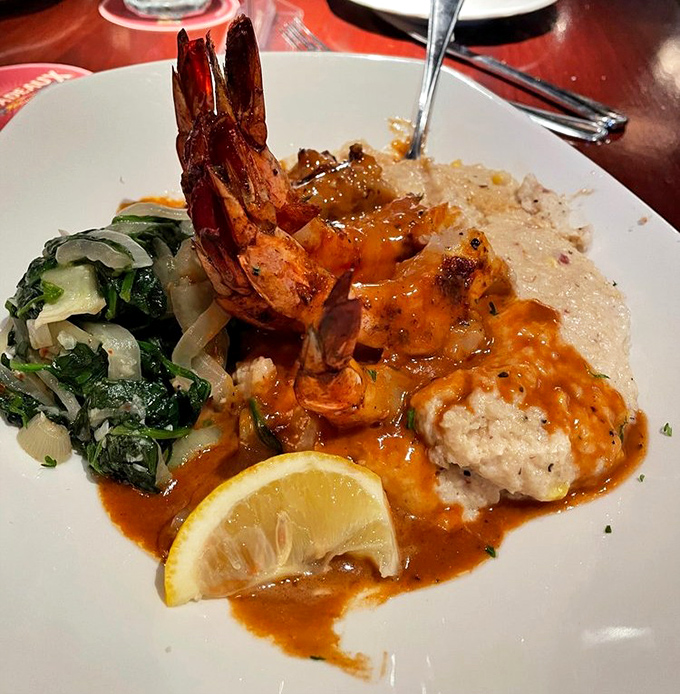 These shrimp aren't just resting on those grits&mdash;they're lounging like they've found the perfect beach chair on a culinary vacation.