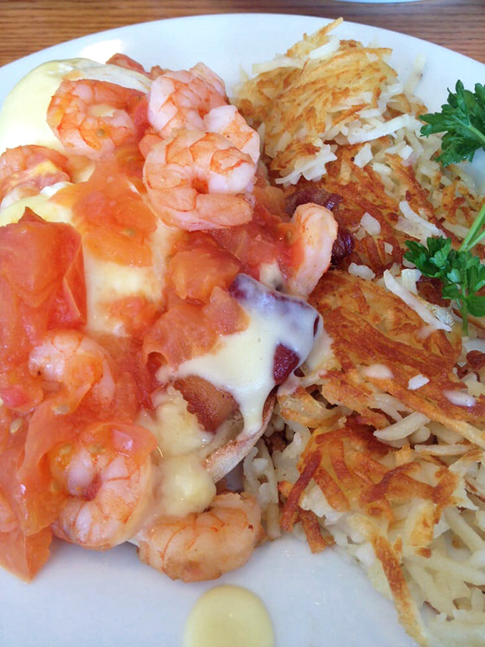 These shrimp benedicts aren't just breakfast, they're an event&mdash;plump shrimp lounging on English muffins like they're at a seafood spa.