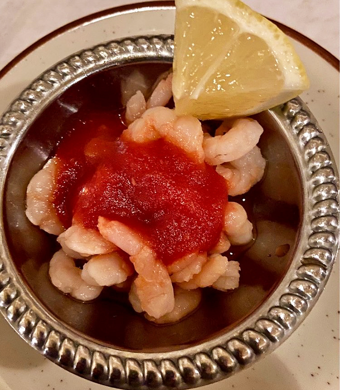 The shrimp cocktail arrives like tiny treasures in a silver chalice&mdash;plump, pristine crustaceans that taste like they jumped from ocean to plate with just a brief detour through heaven.