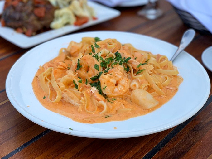 This seafood pasta isn't just a dish, it's a maritime celebration where plump shrimp and tender pasta swim in a creamy sauce that would make Neptune himself request seconds.