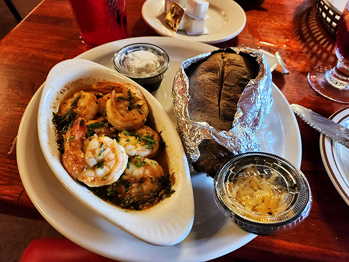 Surf meets turf in perfect harmony. These plump, garlicky shrimp alongside a foil-wrapped potato prove Frontier isn't just about beef. 