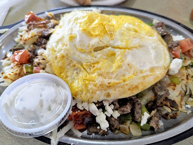 This breakfast skillet is what morning dreams are made of&mdash;a beautiful chaos of eggs, veggies, and cheese that puts cereal to shame.