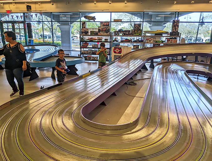 Not all treasure hunting involves credit cards! This slot car racing track keeps kids entertained while parents debate whether they "need" another pair of sunglasses.