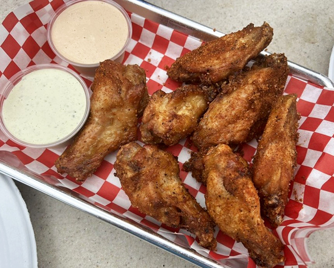 These aren't just wings; they're crispy little messengers of joy that make you forget napkins exist for a reason.