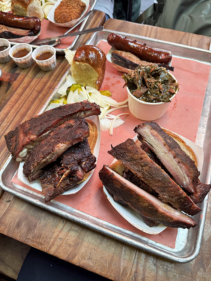 Ribs with that perfect smoke ring and bark that would make a tree jealous. The kind of barbecue that makes you temporarily forget table manners exist.