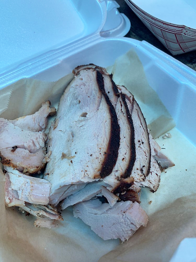 Smoked turkey that defies the "dry poultry" curse&mdash;each slice a testament to patience, smoke, and barbecue wisdom.