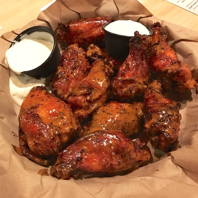 Wings that don't need a sporting event as an excuse. That glaze catches the light like stained glass windows in the cathedral of barbecue.