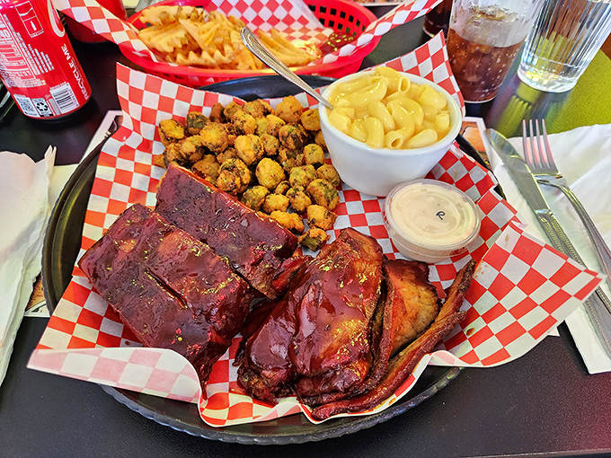 The Three Meat Feast in all its glory. Ribs, sides, and enough BBQ to make you consider wearing stretchy pants to dinner from now on.