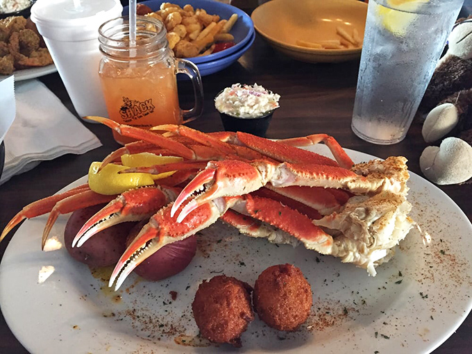 Snow crab legs so impressive they deserve their own zip code, accompanied by hushpuppies that didn't come from a freezer bag.