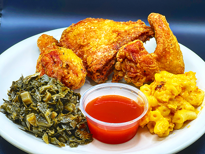 The holy trinity of Southern comfort: perfectly fried chicken, collard greens with soul, and mac and cheese that could make grandma jealous.