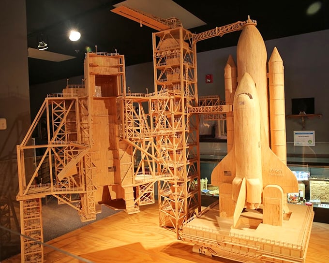 Houston, we have a masterpiece! The space shuttle and launch tower complex demonstrates that rocket science and matchstick artistry aren't so different after all.