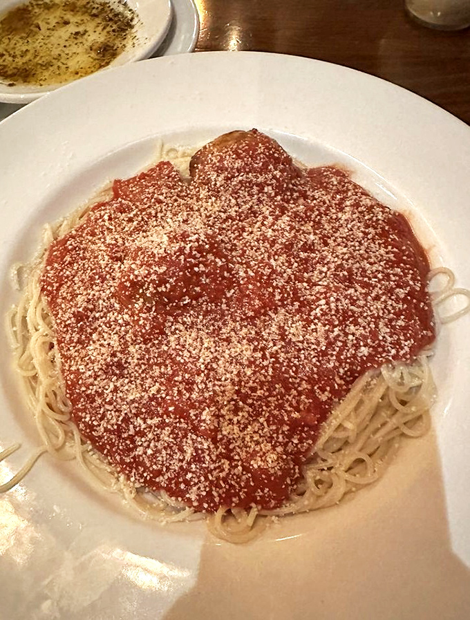 Spaghetti and meatballs&mdash;the Sinatra of Italian-American cuisine&mdash;gets the star treatment with a generous dusting of cheese and a sauce worth sopping up with extra bread.