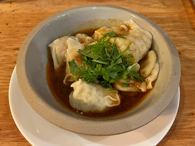 Swimming in a bath of savory broth, these plump shrimp wontons aren't just dumplings&mdash;they're little packages of joy waiting to be unwrapped by your eager chopsticks.