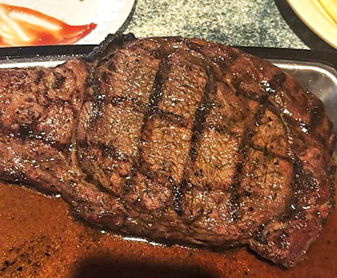 A steak so perfectly seared it deserves its own Instagram account. The grill marks tell stories of patience and precision.