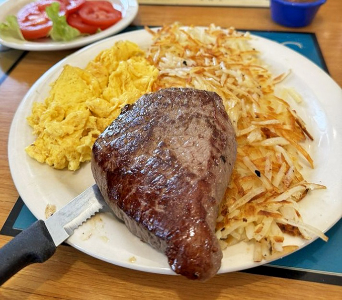 When a steak for breakfast feels completely rational. Those hash browns have achieved the perfect crisp-to-tender ratio.