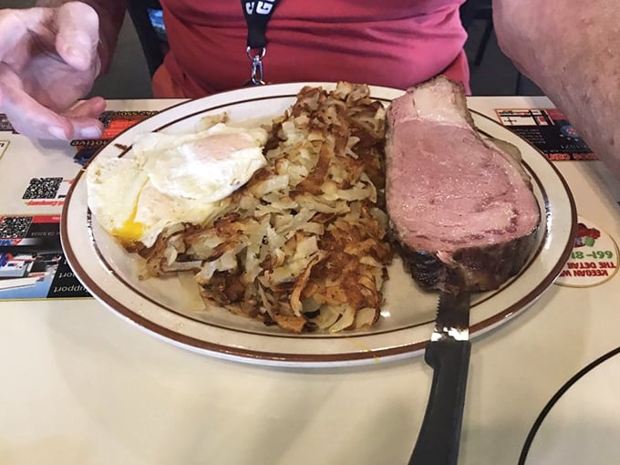Hash browns so crispy they deserve their own fan club, alongside eggs and ham that would make Dr. Seuss proud. Simple perfection on a classic diner plate.