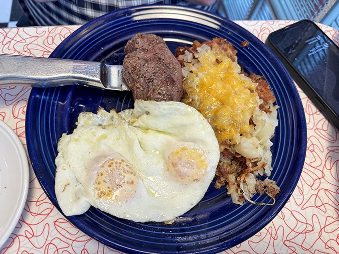 Steak and eggs with hash browns prove that sometimes the simplest combinations create the most profound happiness.