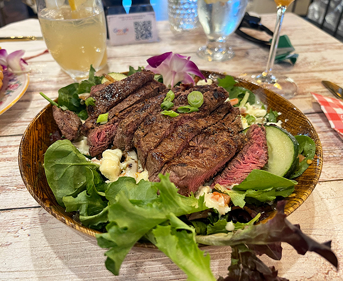 Perfectly seared steak atop fresh greens&mdash;proof that salads don't have to be punishment. This is what vegetables dream of becoming.