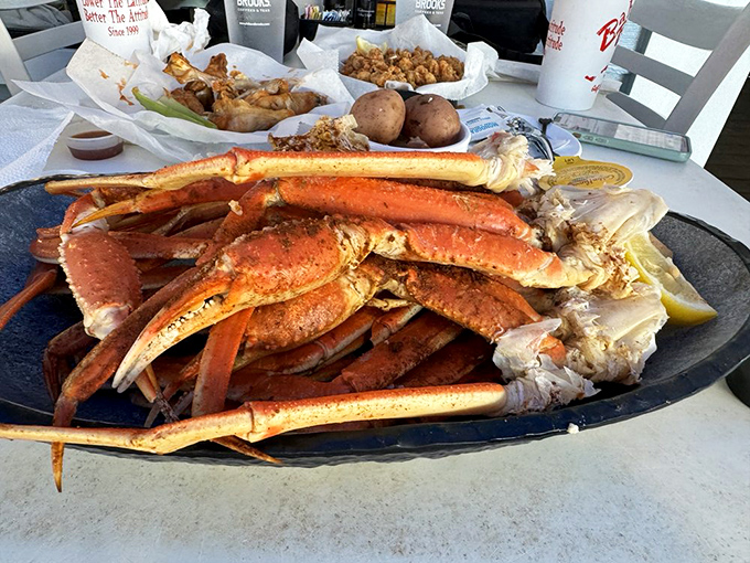 These crab legs sprawl across the plate like edible treasure, demanding your full attention and possibly a second set of hands.