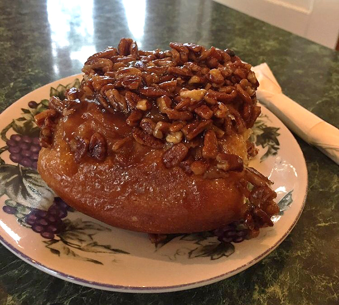 This sticky bun isn't just breakfast&mdash;it's an event. A spiral of cinnamon-sugar perfection crowned with enough pecans to make a squirrel weep with joy.