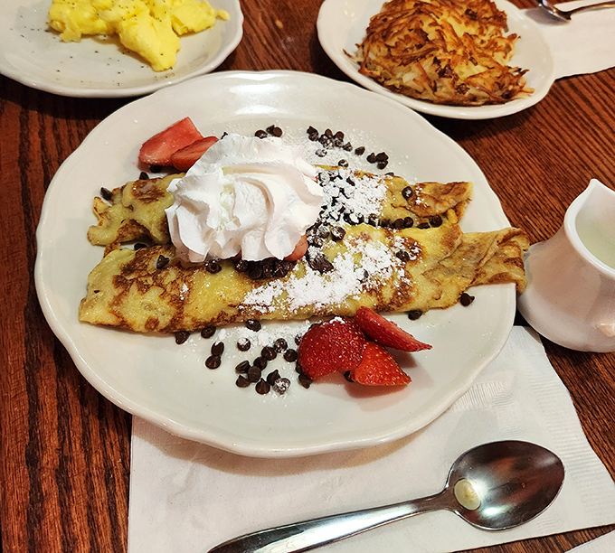 These crepes don't just hold strawberries and cream &ndash; they embrace them in a delicate pancake hug that makes fruit feel special.