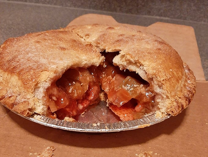 Peek inside this strawberry rhubarb pie and witness the perfect marriage of sweet and tart. Summer captured in a golden crust.