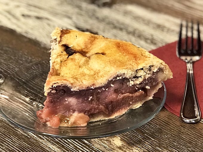 This strawberry rhubarb slice showcases the perfect sweet-tart balance. The crimped edge of that buttery crust deserves its own fan club.