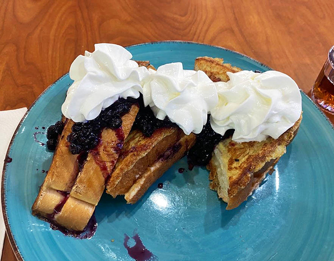 Blueberry-stuffed French toast that makes you question why you'd ever eat anything else for breakfast. The whipped cream isn't optional &ndash; it's essential.