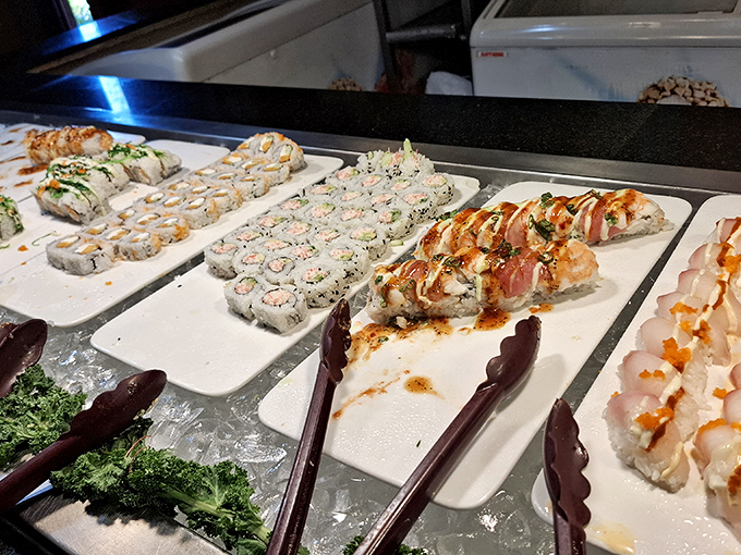 Sushi rolls lined up like edible jewelry, proving that sometimes the best treasures come wrapped in seaweed.