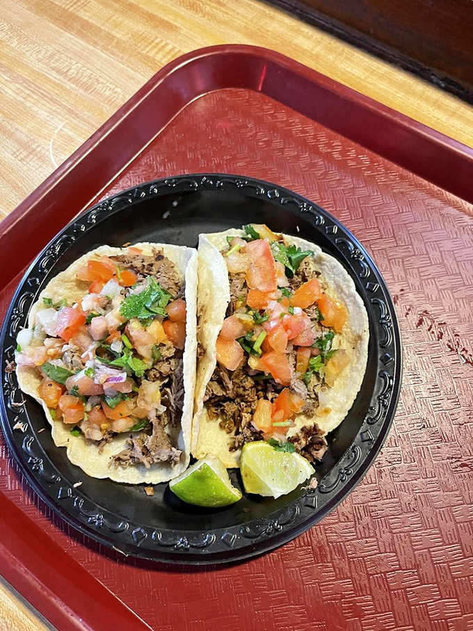 Who knew barbecue joints could pivot to street tacos? These fresh-topped beauties prove good smoke knows no cultural boundaries.