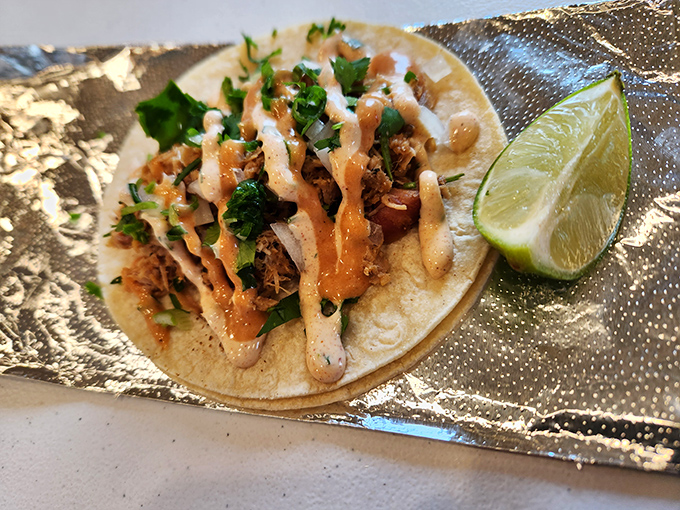 Taco Tuesday just got a smoky upgrade. Fresh cilantro, tender meat, and that squeeze of lime create a handheld flavor bomb that's worth the trip alone.