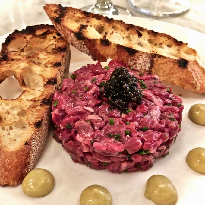 Beef tartare topped with caviar and served with grilled bread, because sometimes raw and fancy is exactly what sophistication tastes like.