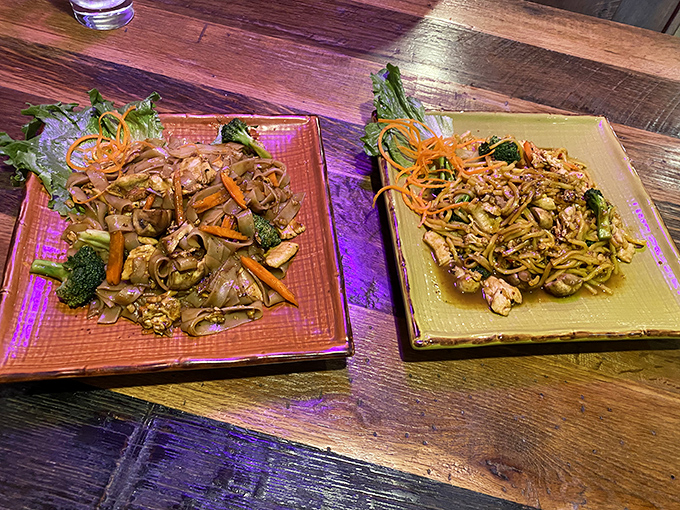 Two plates, twice the flavor. Thai noodle dishes that prove sometimes the best conversations happen when words are paused for another perfect bite.
