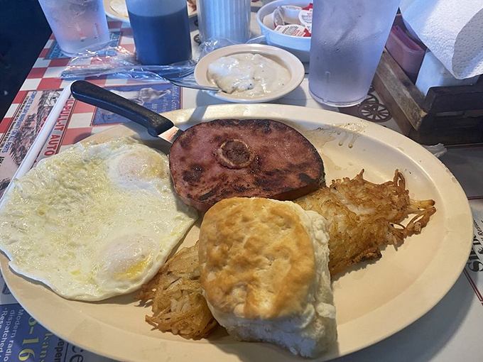 The Hog Wild breakfast isn't just a meal, it's a commitment&mdash;one that rewards your bravery with perfectly cooked eggs and a ham steak that means business.