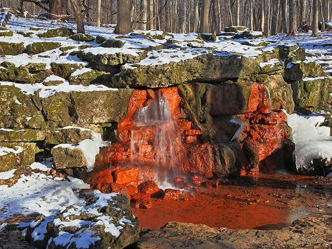 The famous Yellow Spring itself, with its iron-rich waters creating that otherworldly orange glow. Nature's own lava lamp, minus the groovy '70s vibes.
