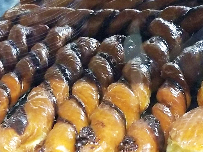 Tiger tails lined up like edible art&mdash;twisted perfection of chocolate and vanilla dough that makes you wonder why regular donuts don't come with stripes.